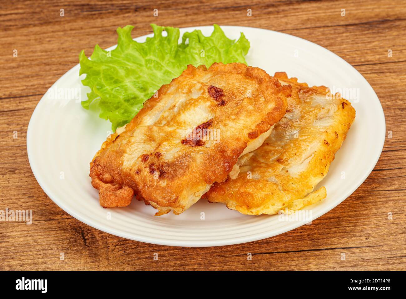 Roasted cod fish in the bread Stock Photo - Alamy
