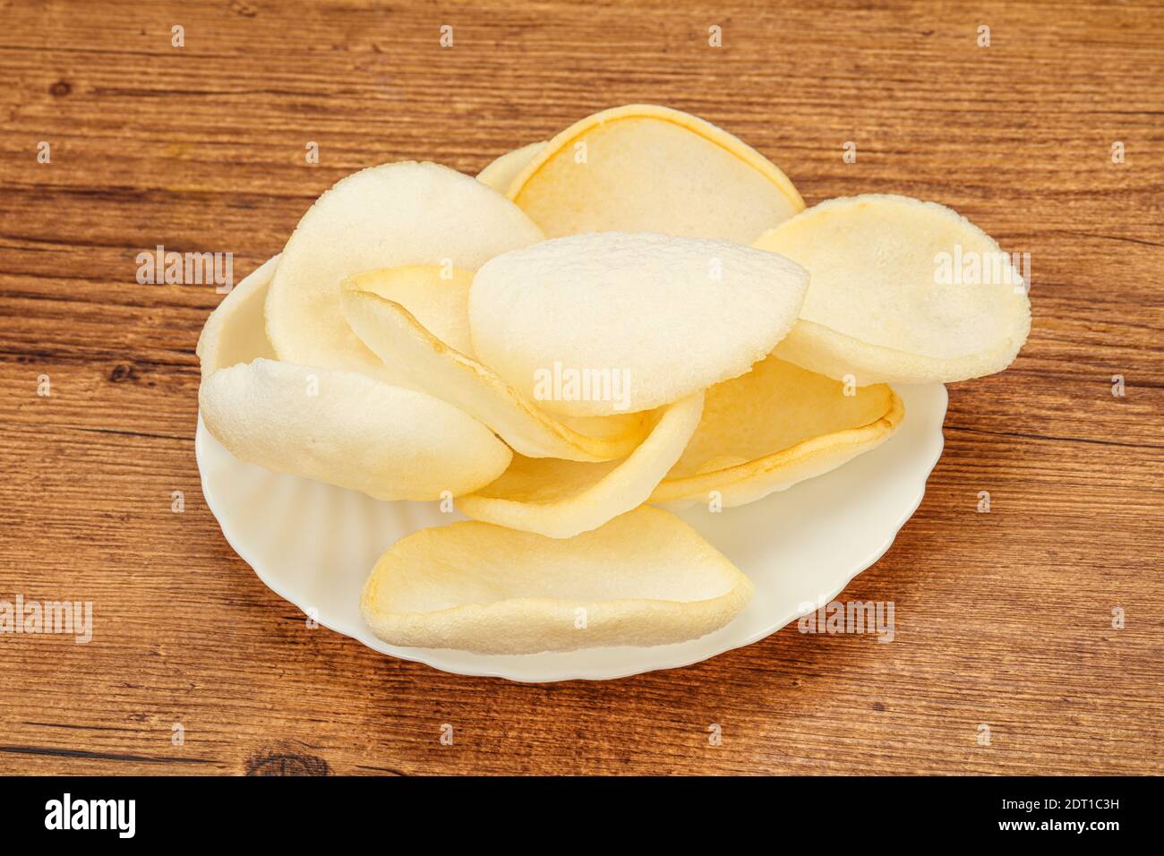 Asian cusine - homemade prawn chips in the bowl Stock Photo - Alamy
