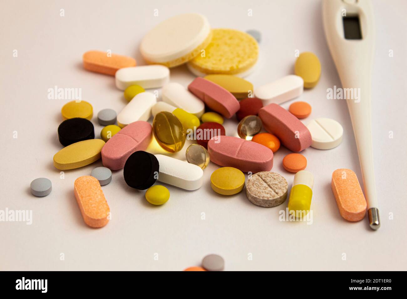 Tablets of different colors and sizes on a white background Stock Photo ...