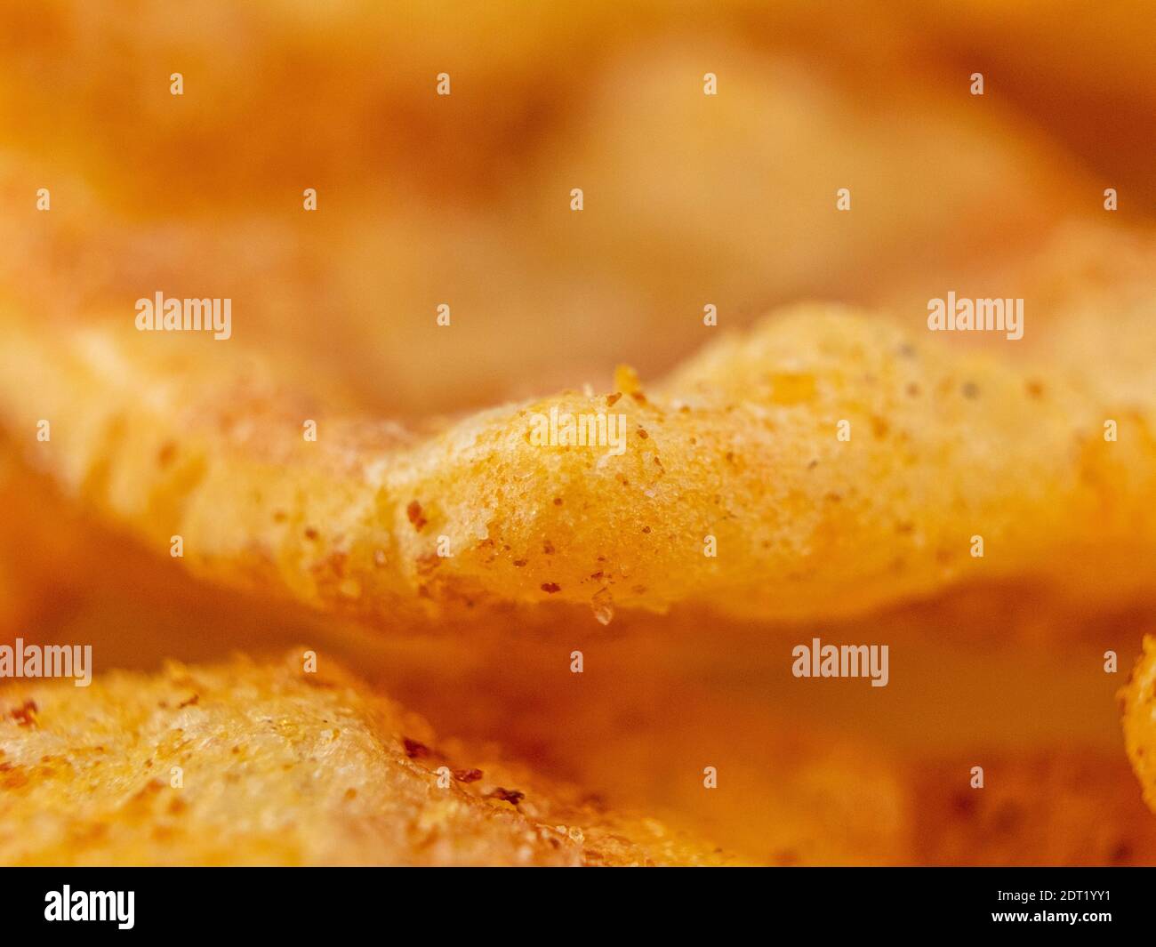 Macro photo Chips in salt and spices Stock Photo - Alamy