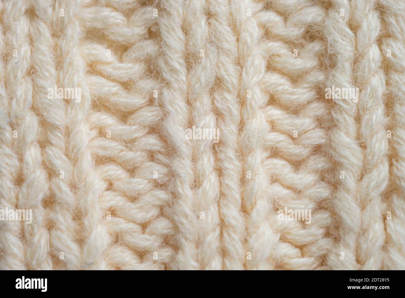 White background of knitted thread pattern Stock Photo - Alamy