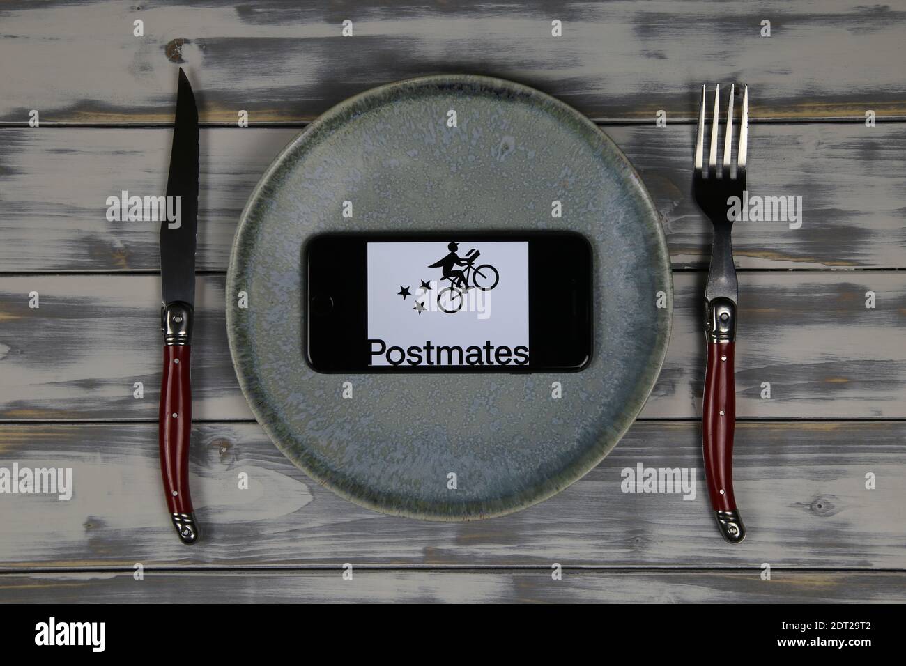 Food delivery service postmates hi-res stock photography and images - Alamy