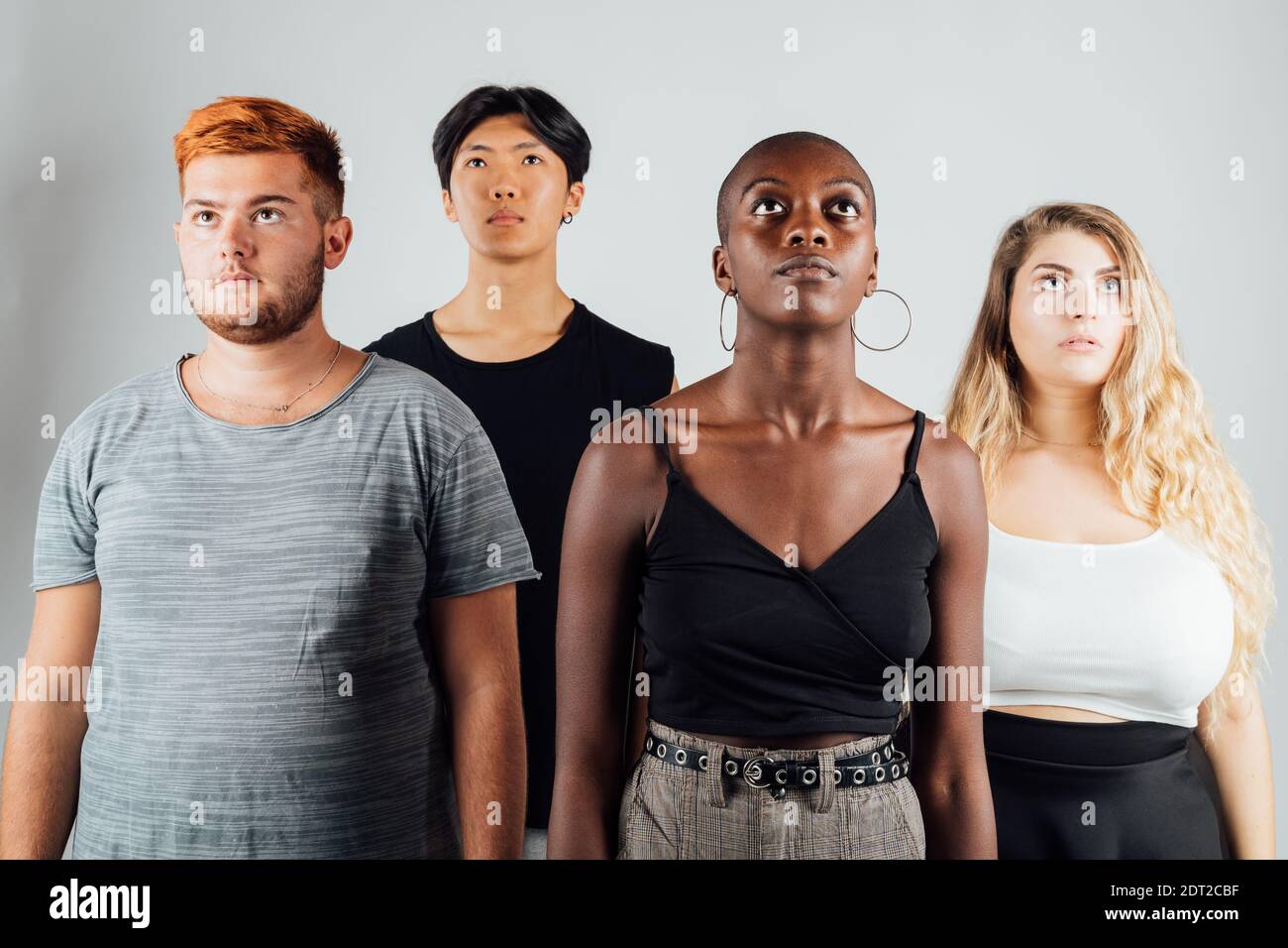 Four young men hi-res stock photography and images - Alamy