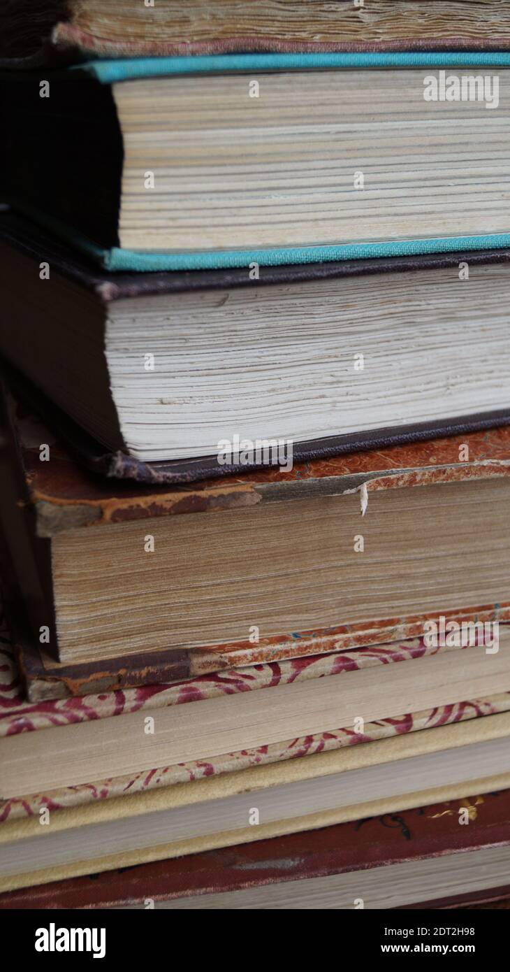 Antique books stack spines hi-res stock photography and images - Alamy