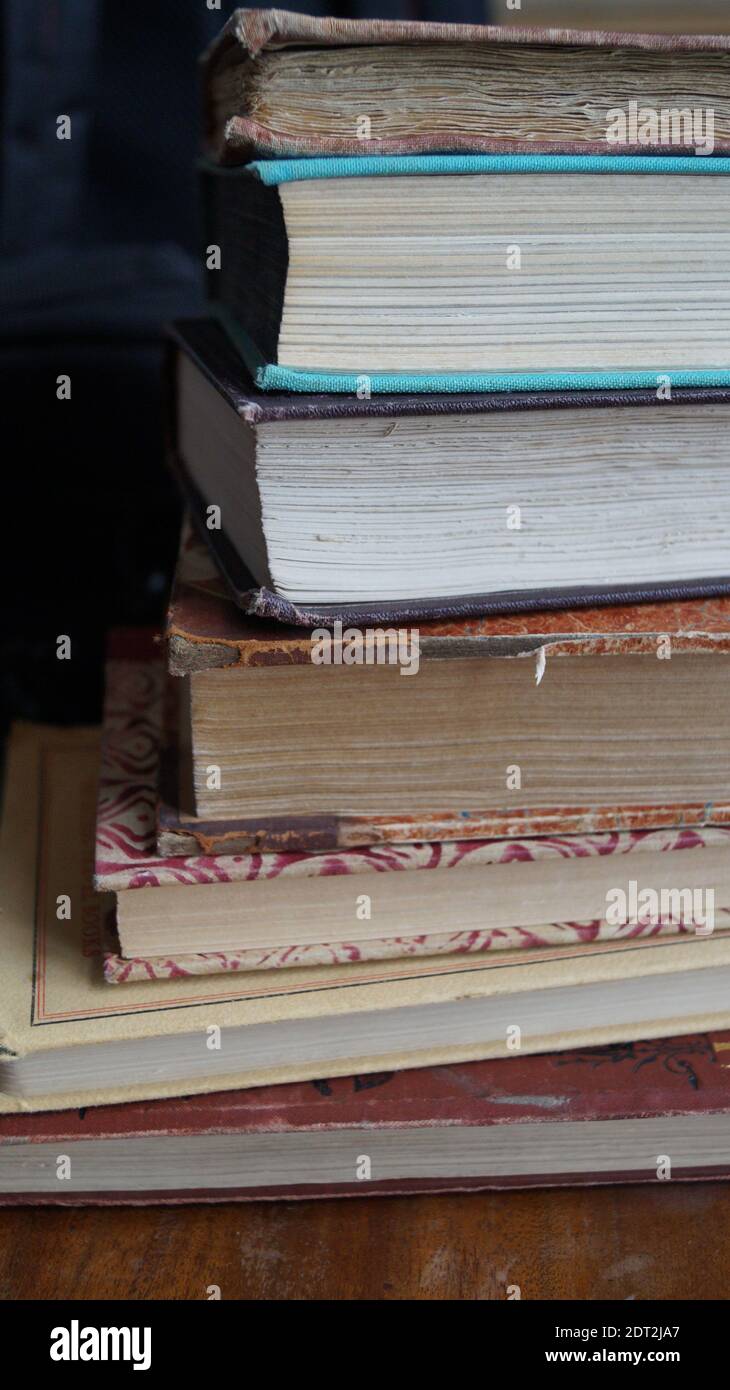 Antique books stack spines hi-res stock photography and images - Alamy