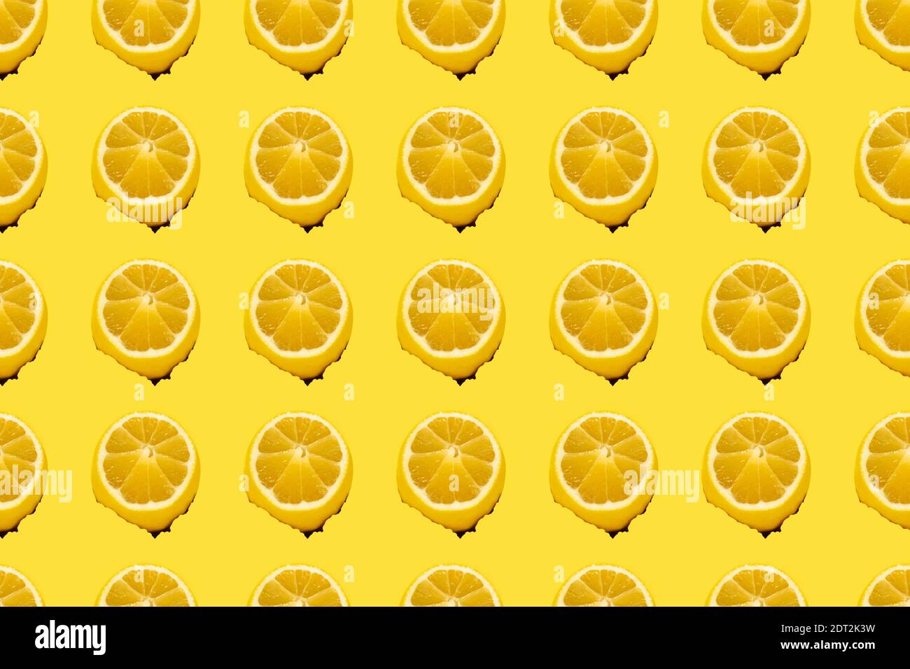 Pattern of Torn hole on a yellow background and lemon as a source of ...