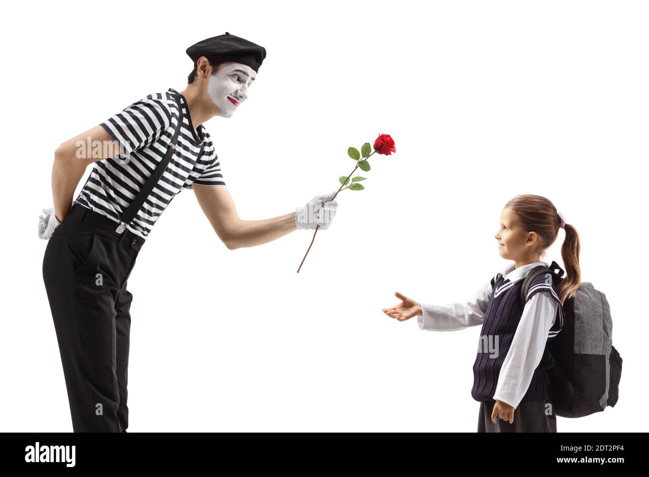 Mime actor giving red rose to a schoolgirl isolated on white background ...
