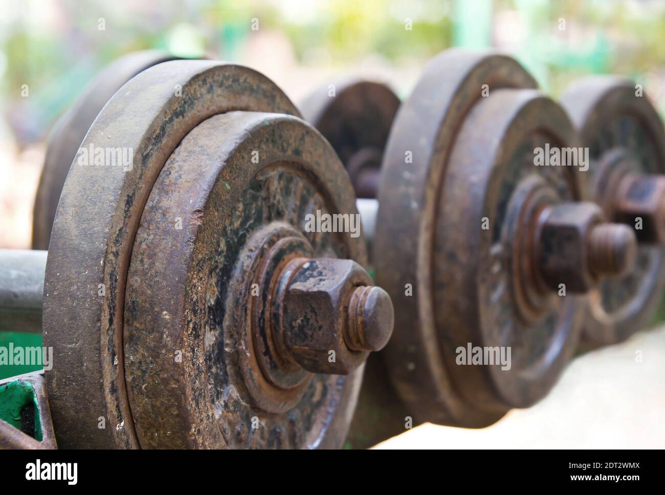 Old iron dumbbells exercise weights hi-res stock photography and images ...