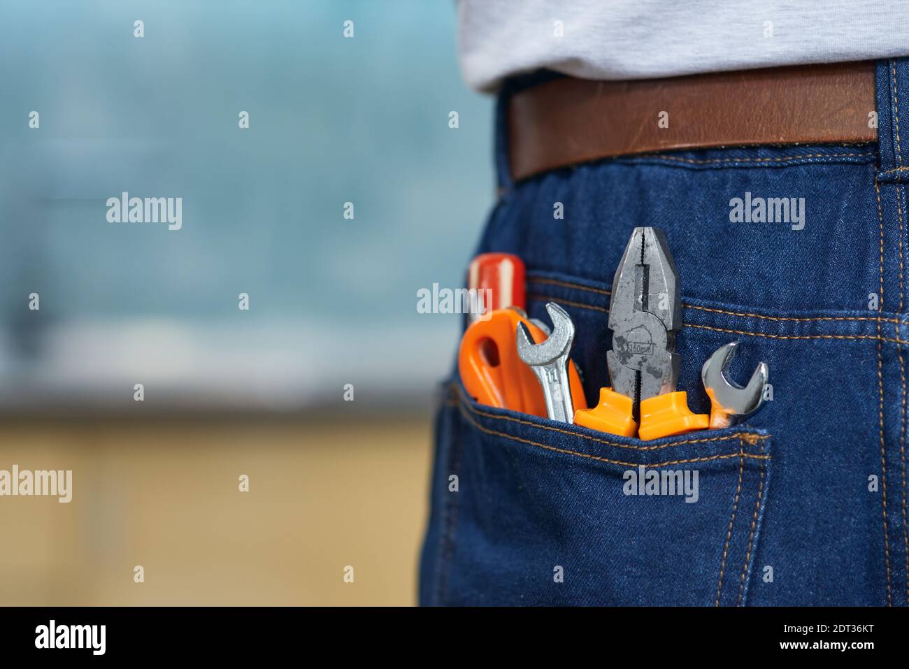 Construction tools in jeans hi-res stock photography and images - Alamy
