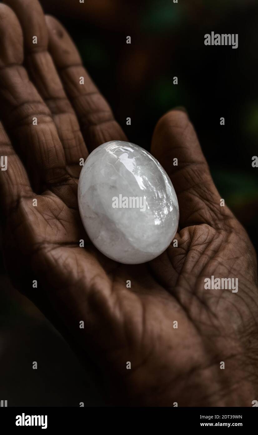 Hands holding marbles hi-res stock photography and images - Alamy