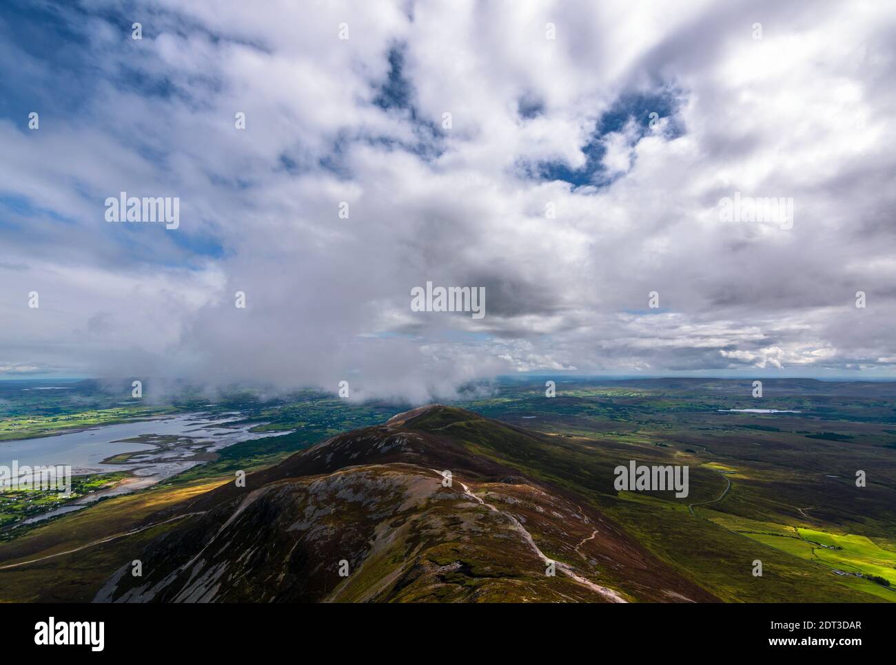 Mountains and clouds, amazing view from top of the mountain Croagh ...