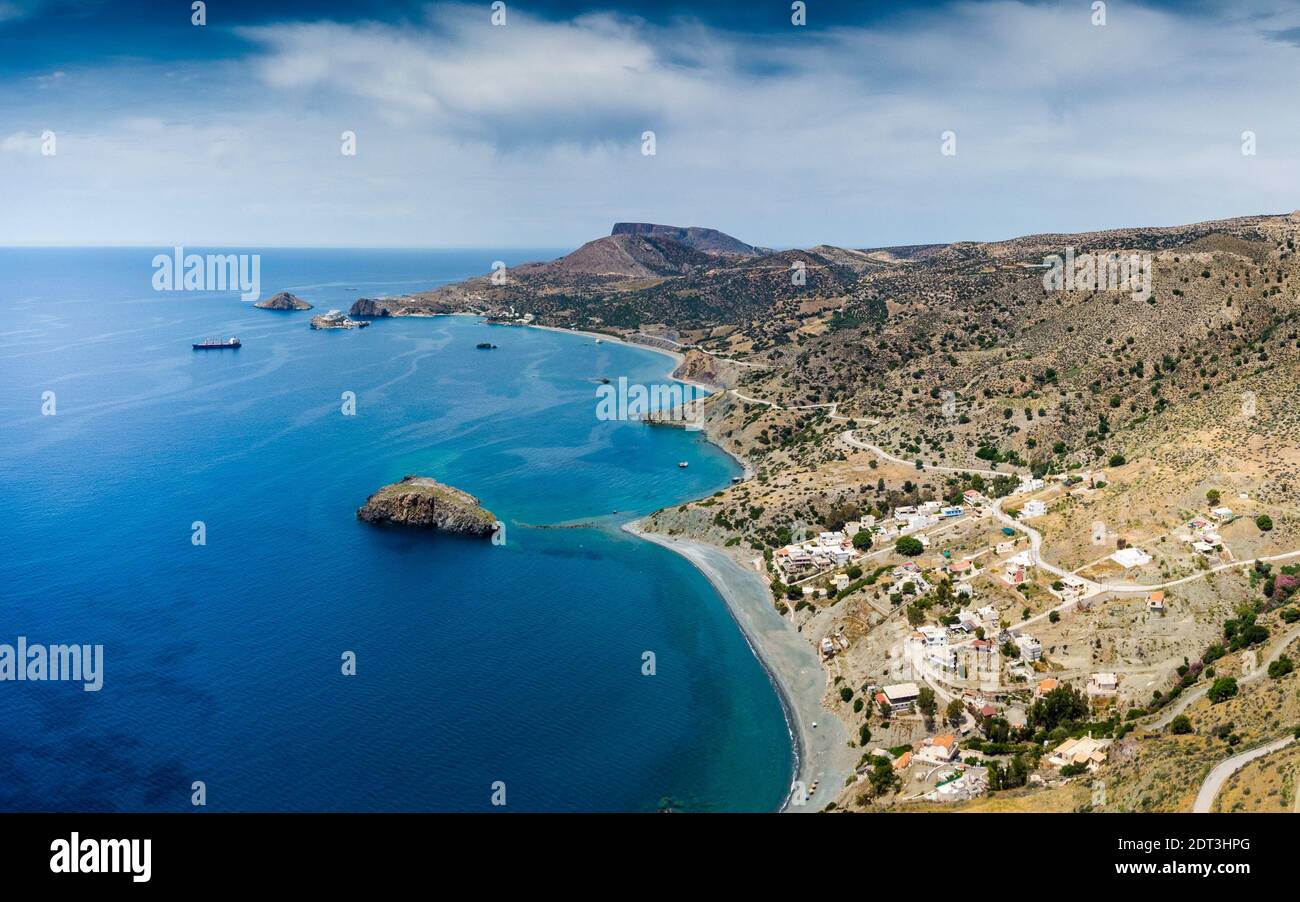 Idyllic view of sea and coastline with fluffy clouds in sky, crete ...