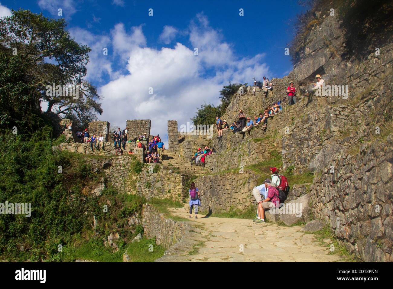 Machu Picchu, Peru - June 22, 2015: Tourist explore the sun gate at ...