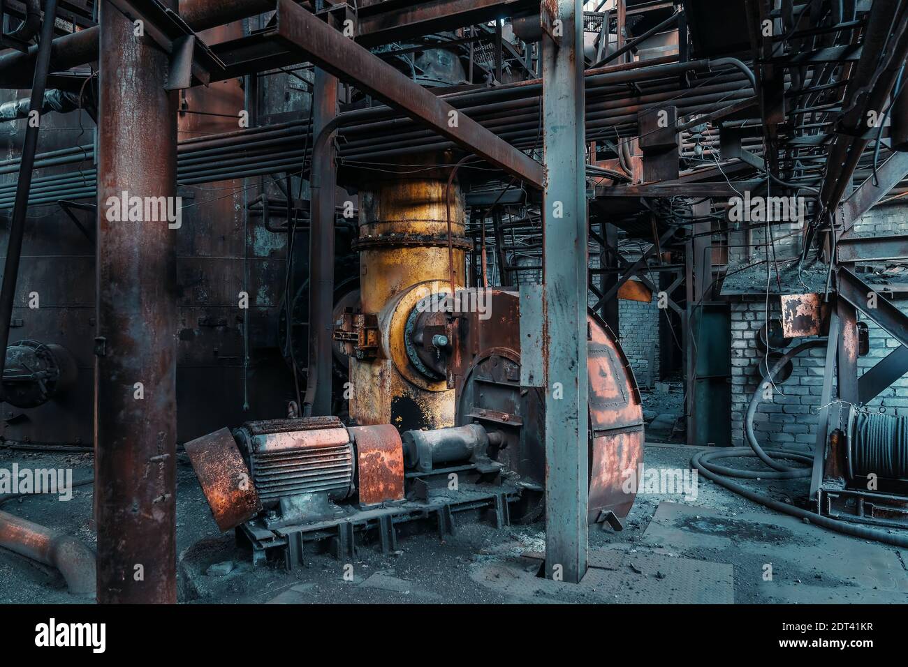 Steel rusty equipment in old creepy abandoned metallurgical factory ...