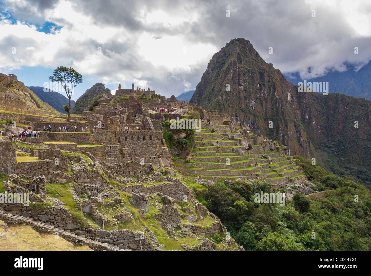 Tourist explore Machu Picchu, a 15th-century Inca citadel considered by ...