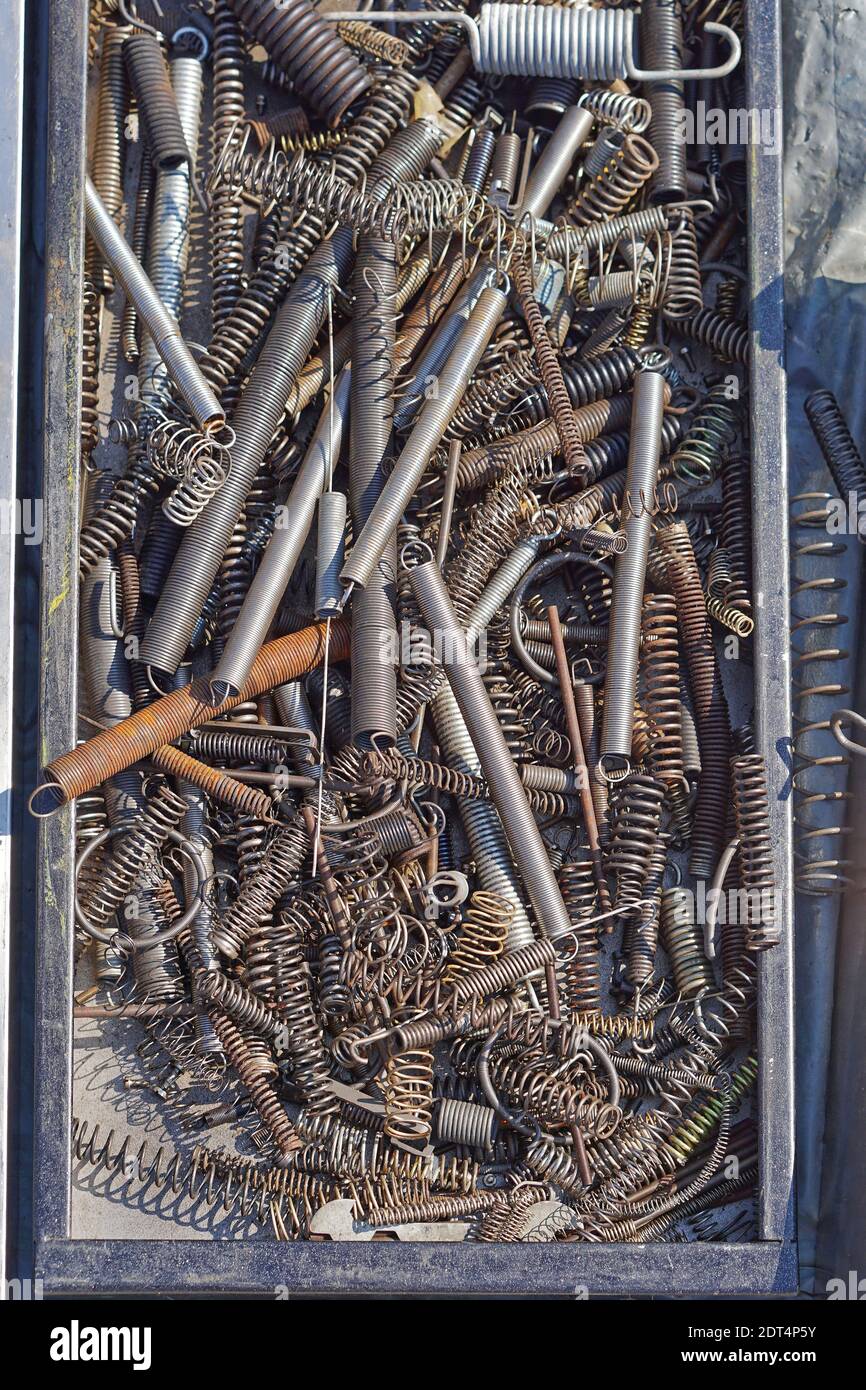 Various size and shape of springs coils in box Stock Photo - Alamy