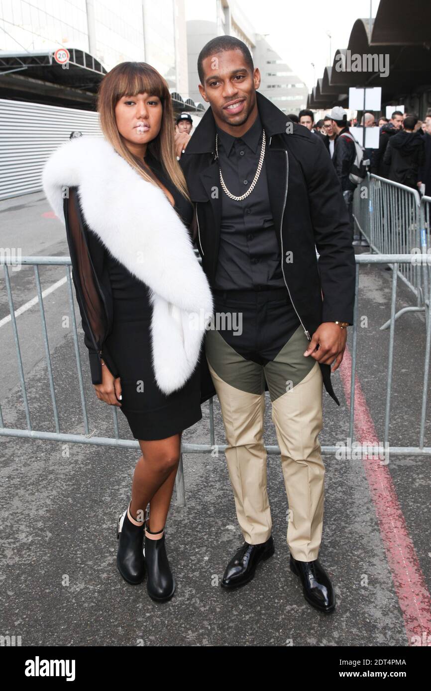 Victor Cruz and his girlfriend Elaina Watley attending Givenchy's Fall ...