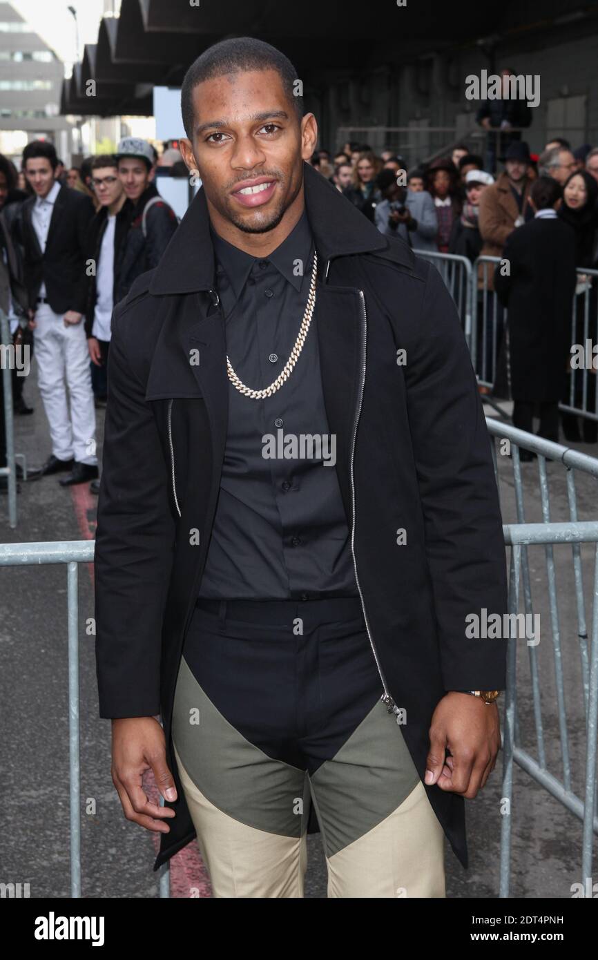 Victor Cruz attending Givenchy's Fall-Winter 2014/2015 men's collection ...