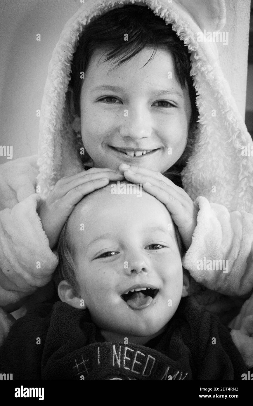 Portrait of brothers smiling together Stock Photo - Alamy