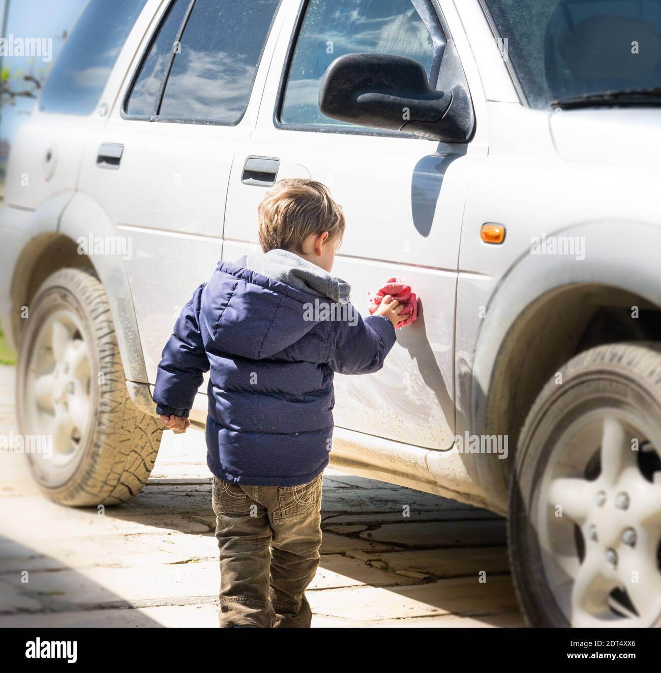 Rear view of little boy washing car outside Stock Photo - Alamy Rear view of little boy washing car outside Stock Photo - Alamy