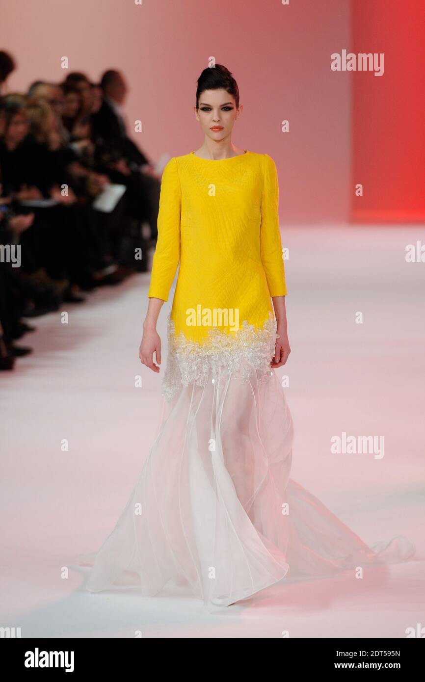 A model displays a creation by designer Stephane Rolland for his Spring ...