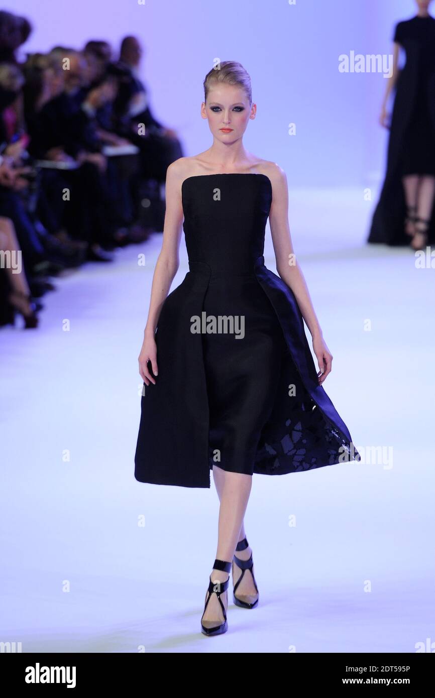 A model displays a creation by designer Stephane Rolland for his Spring ...