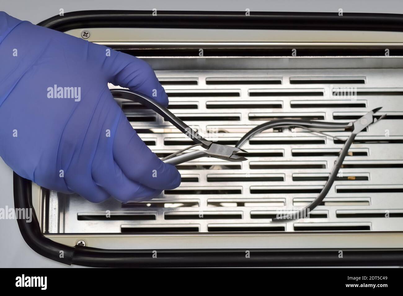 nail clippers after sterilization with hot air in an autoclave against ...
