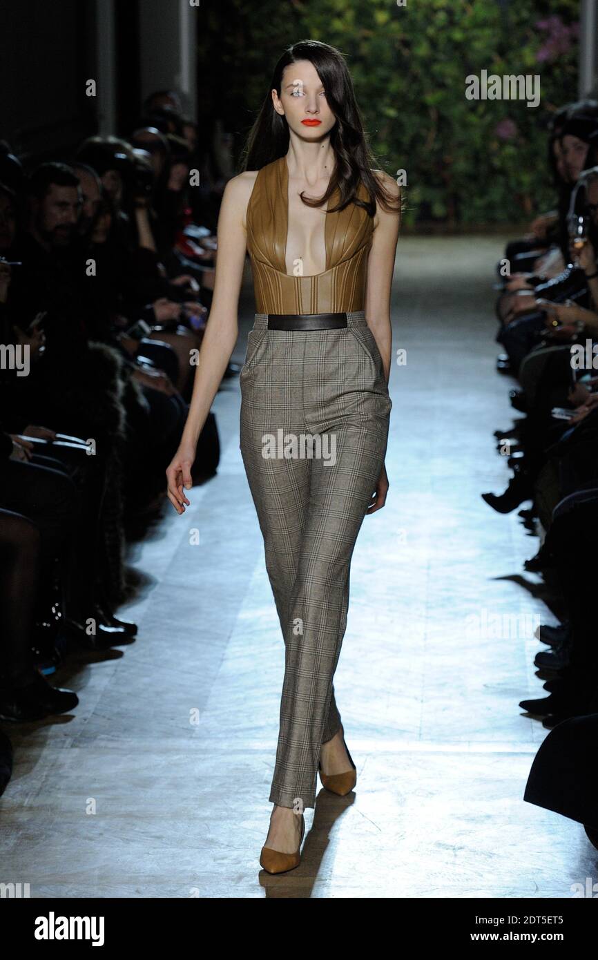 A model displays a creation by designer Didit for his Spring-Summer ...