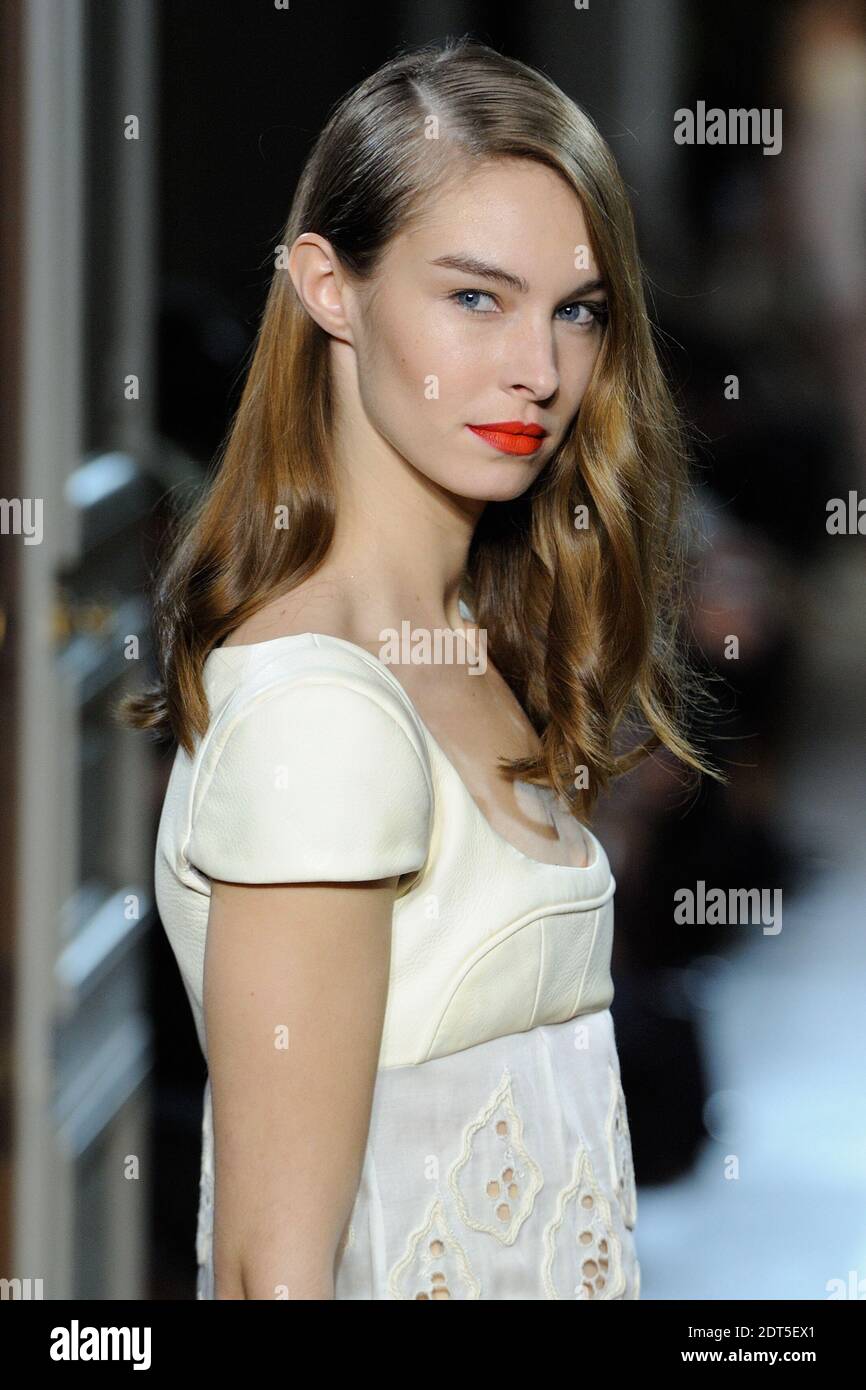 A model displays a creation by designer Didit for his Spring-Summer ...