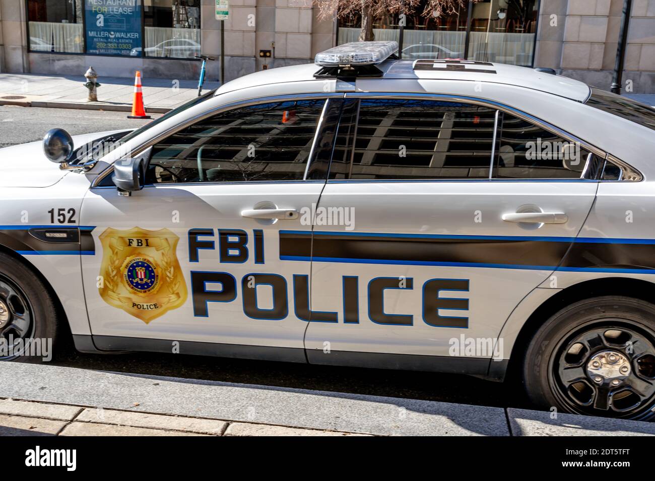 A FBI police car at the J. Edgar Hoover FBI Building in Washington, DC ...