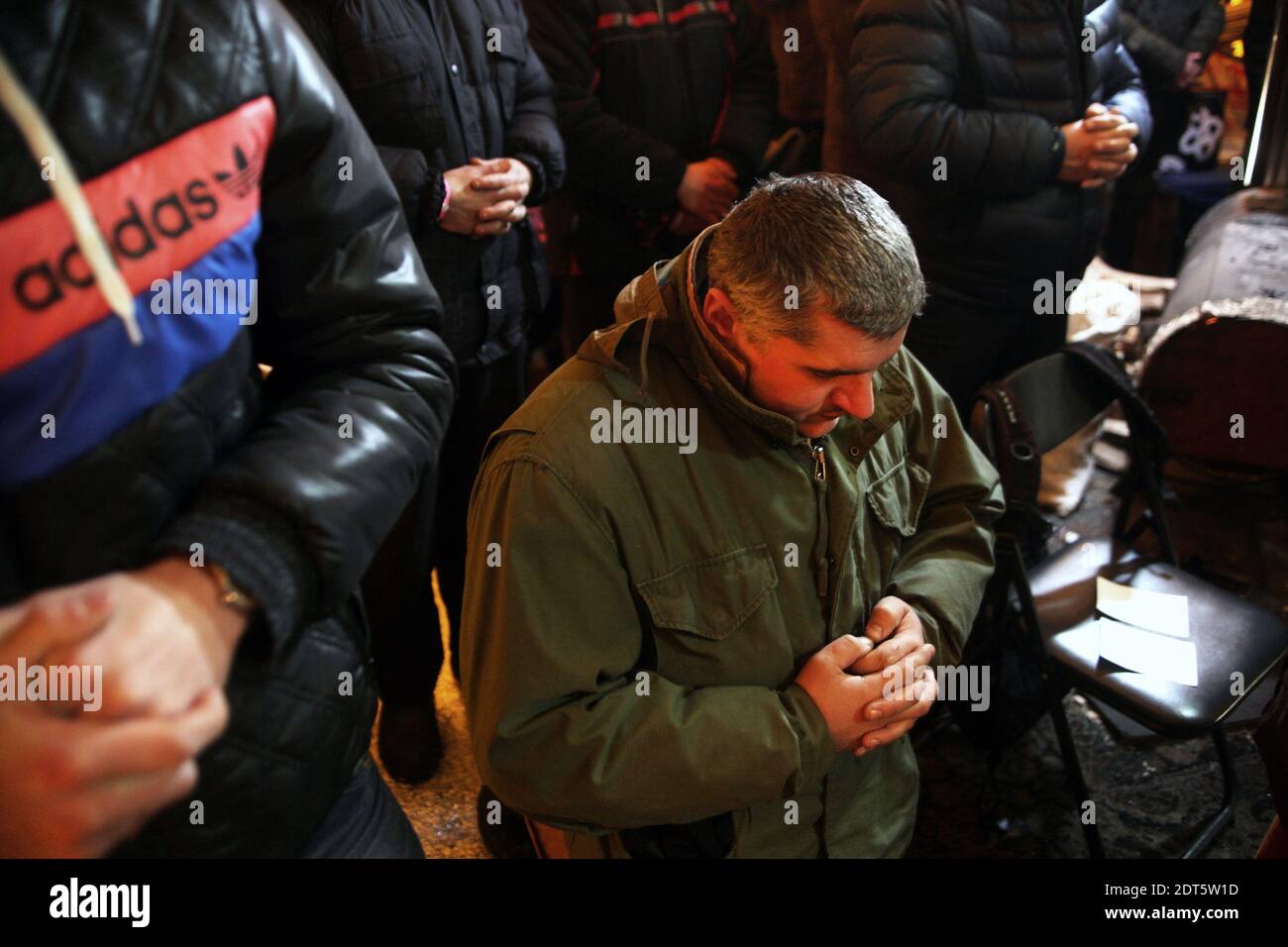 Anti-government protestors pray inside a makeshift chapel in ...