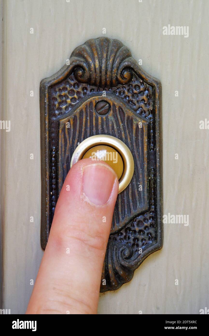 Close up hand doorbell hi-res stock photography and images - Alamy