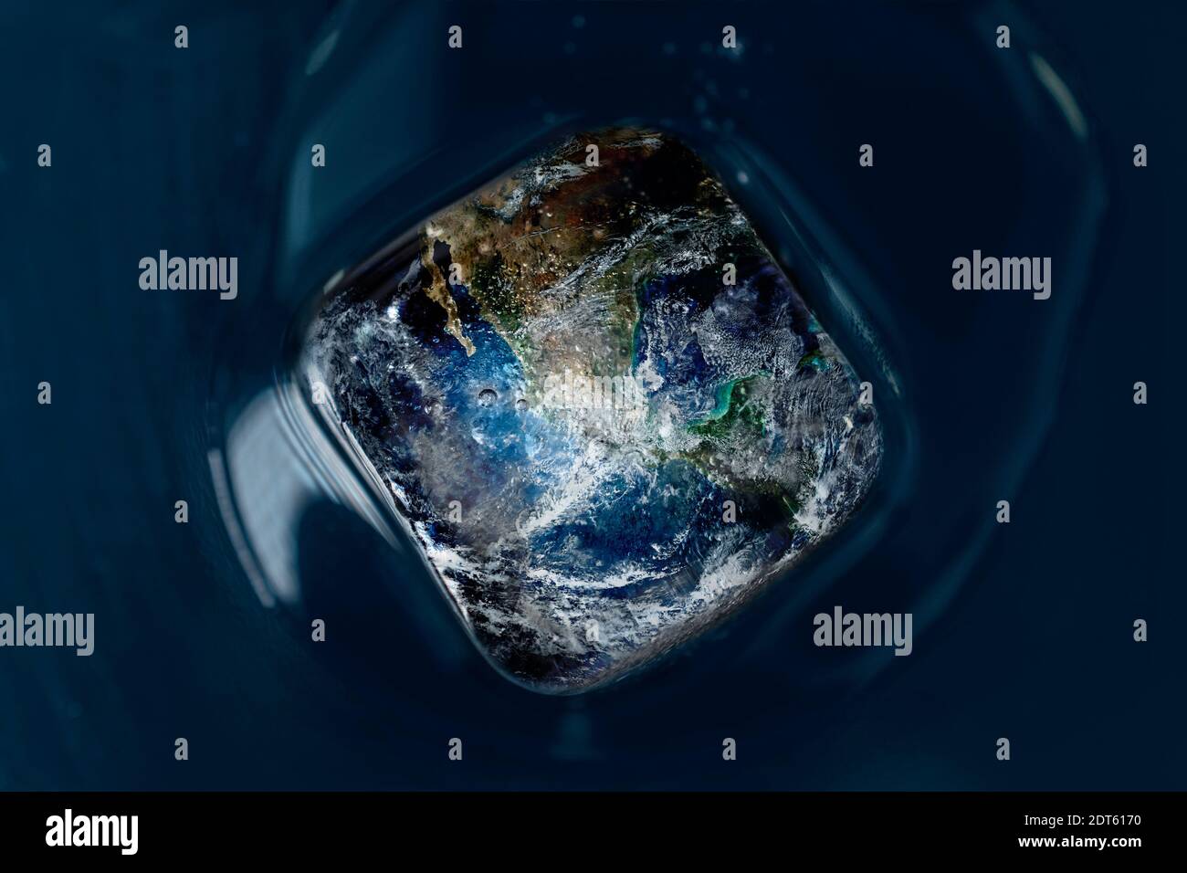 Ice cube melting in puddle hi-res stock photography and images - Alamy