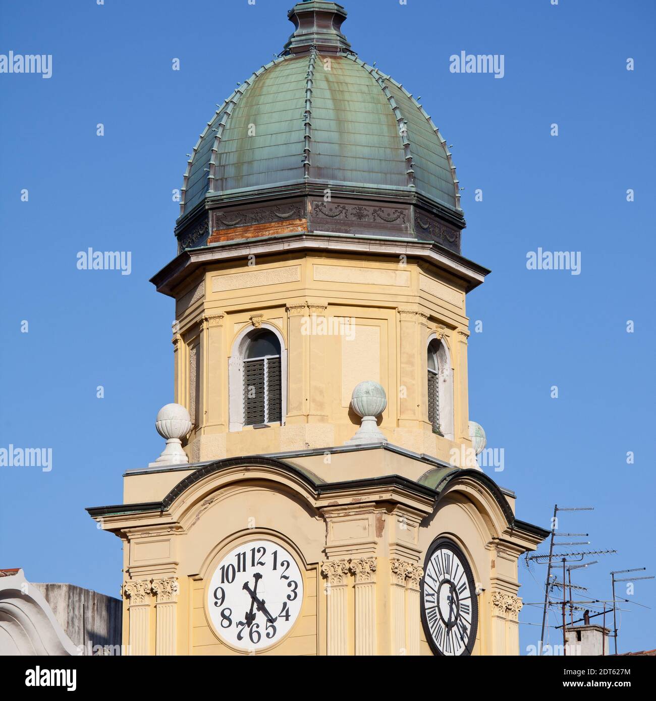 Yellow Clock Tower with Relief in Rijeka, Croatia Stock Photo - Alamy