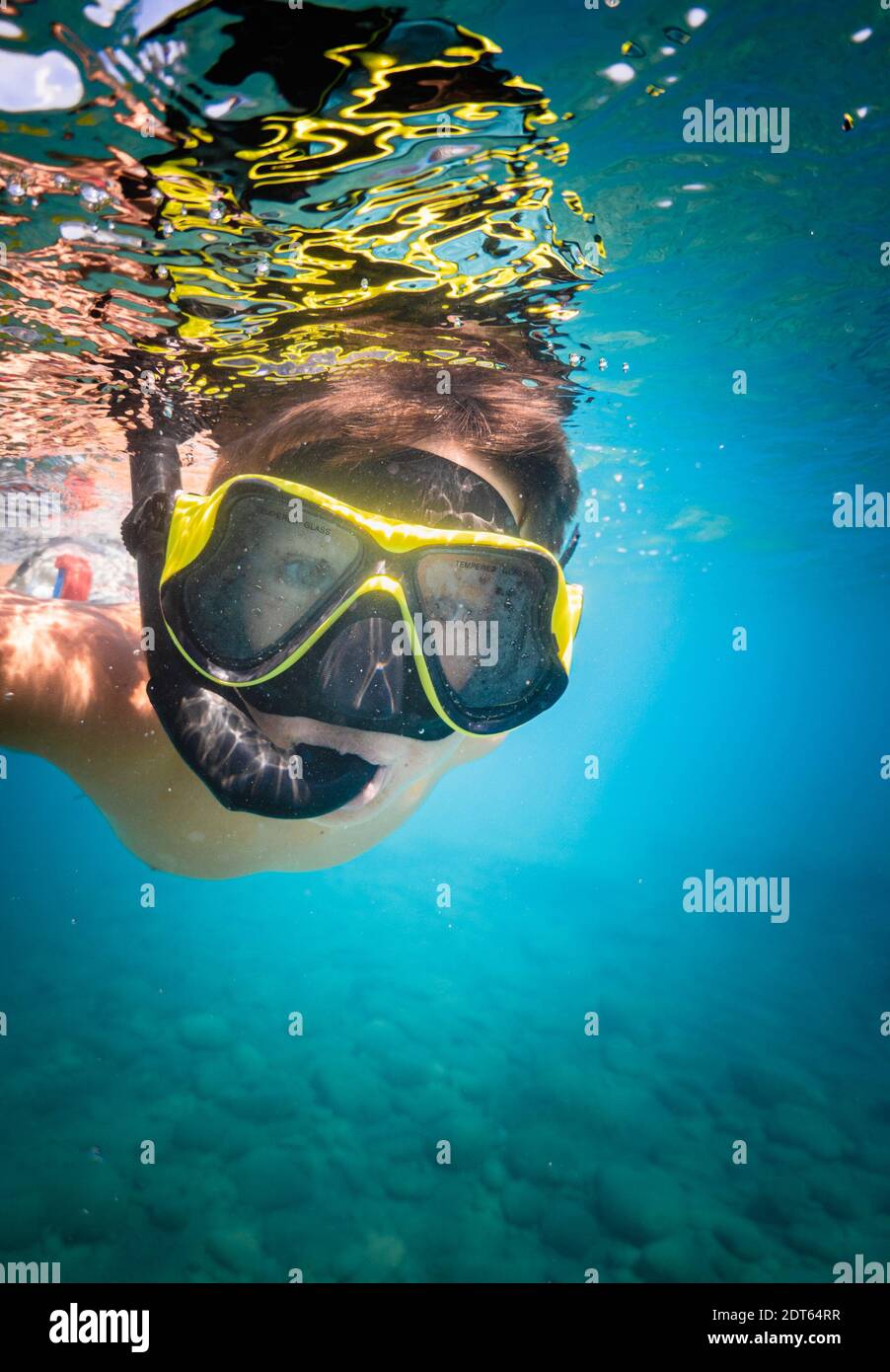 Portrait of boy wearing scuba mask underwater Stock Photo - Alamy