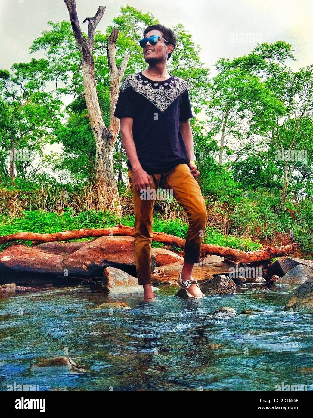 Indian man in shorts standing hi-res stock photography and images - Alamy