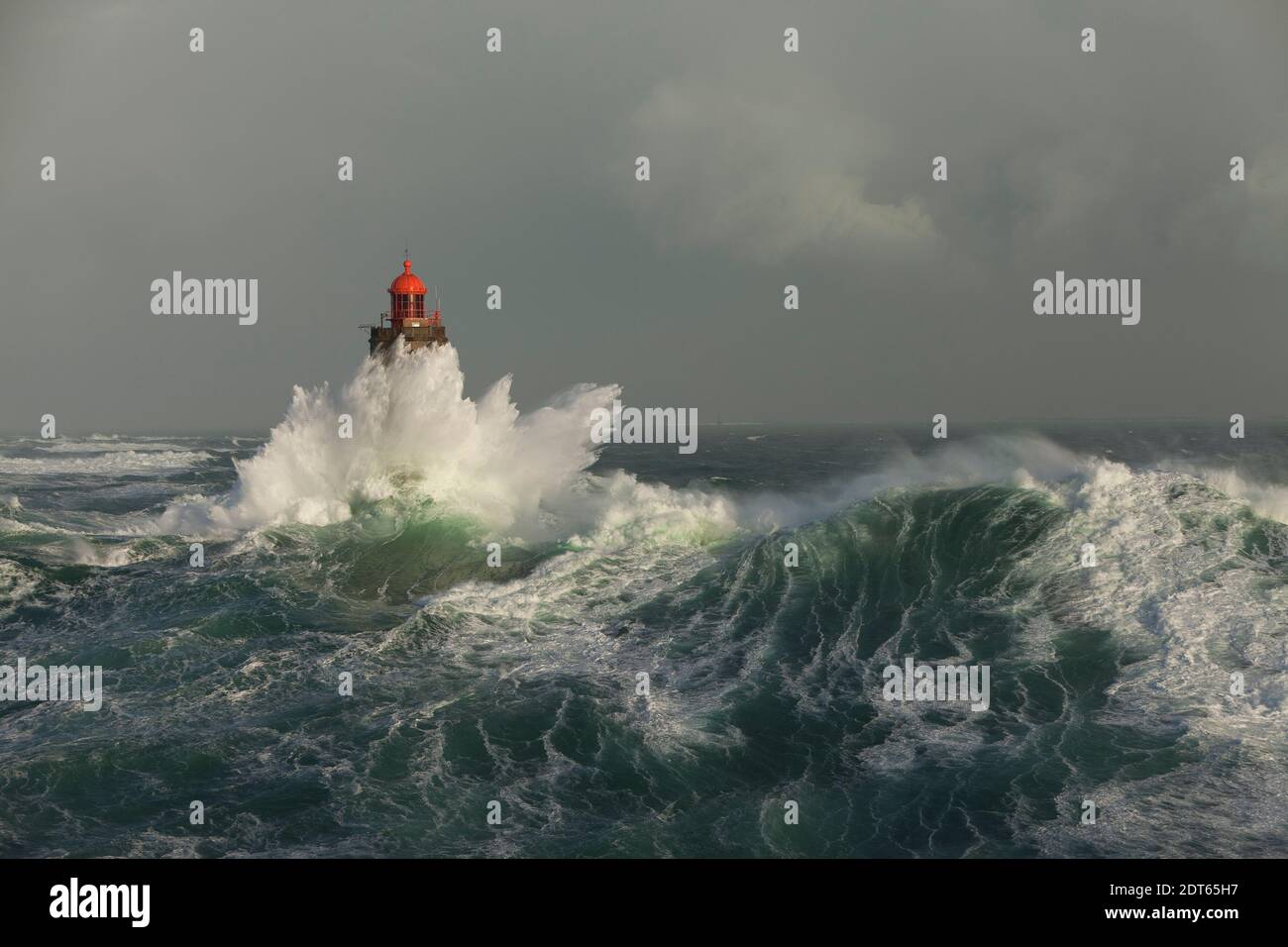 The lighthouse 'La Jument' located off Ouessant Island in the Iroise ...