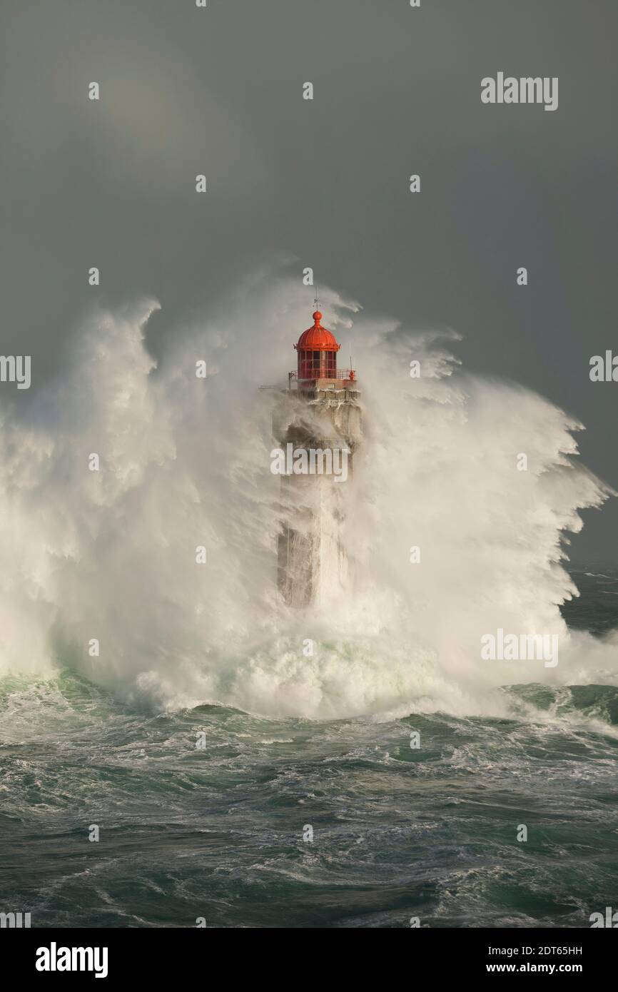 The lighthouse 'La Jument' located off Ouessant Island in the Iroise ...