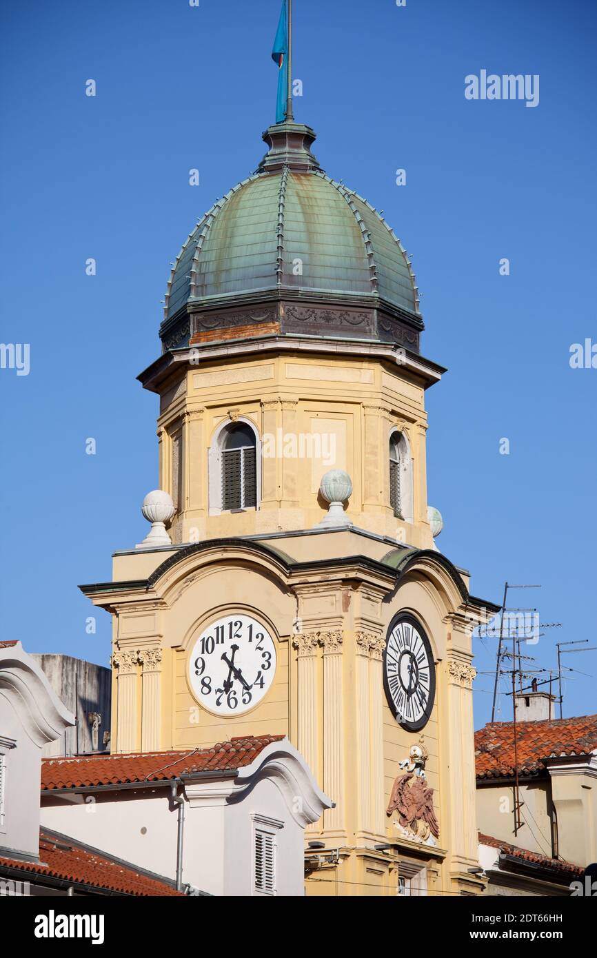 Yellow Clock Tower with Relief in Rijeka, Croatia Stock Photo - Alamy