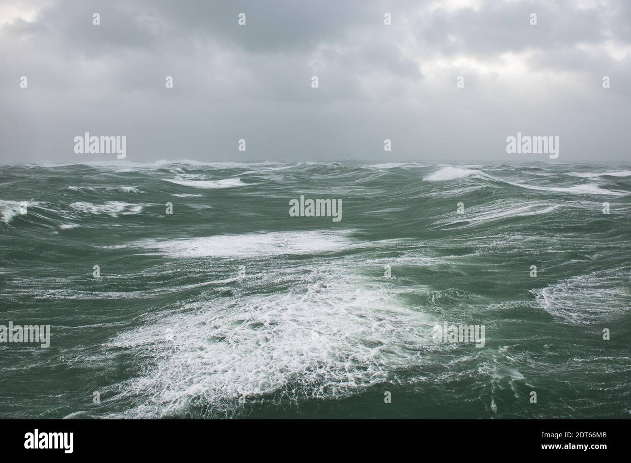 The 'Ar-Men' lighthouse during heavy storm off Brittany, western France ...