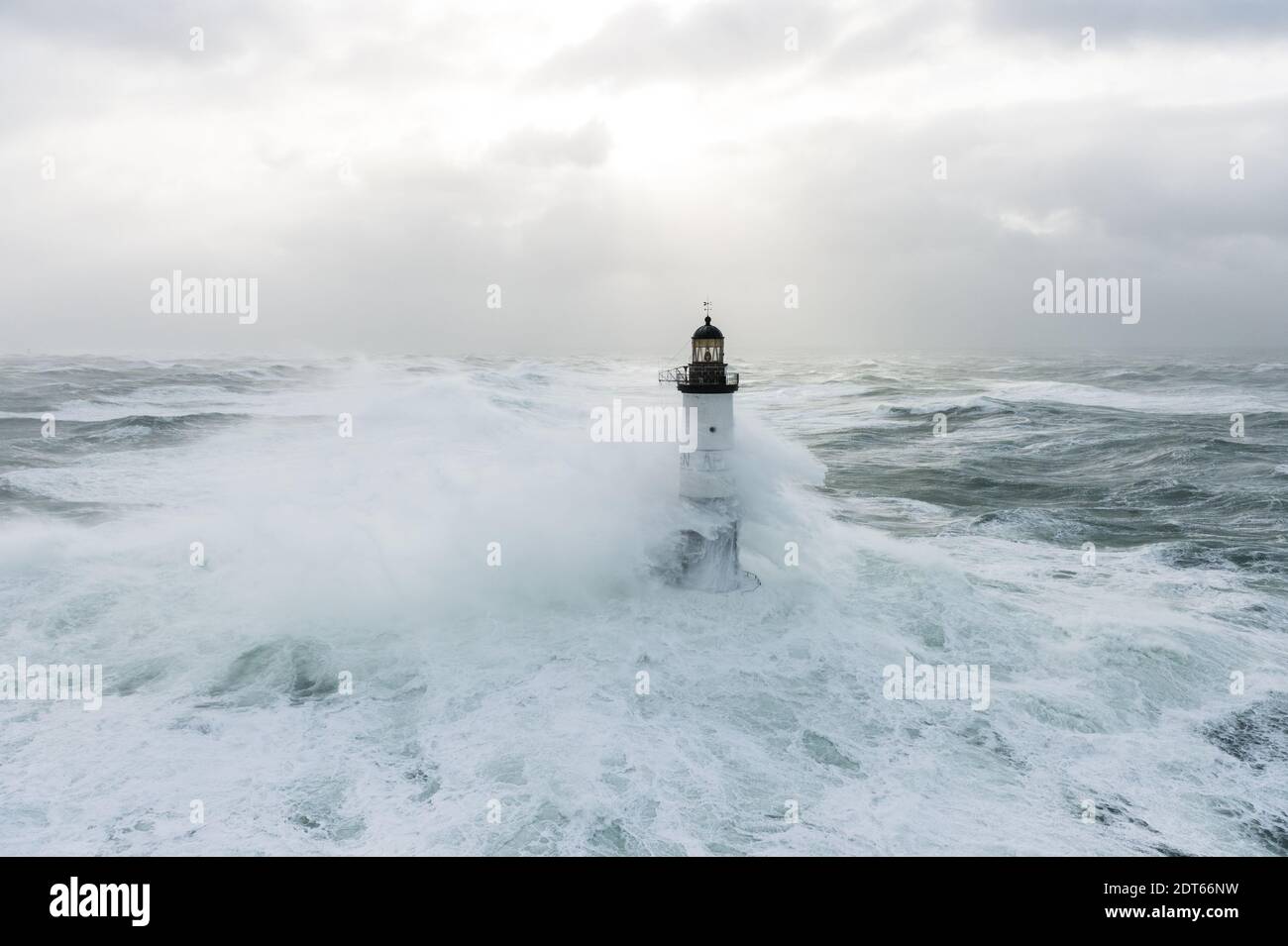 The 'Ar-Men' lighthouse during heavy storm off Brittany, western France ...