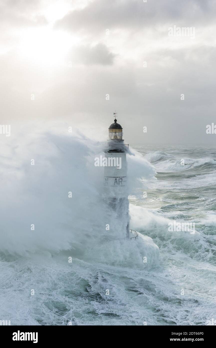 The 'Ar-Men' lighthouse during heavy storm off Brittany, western France ...