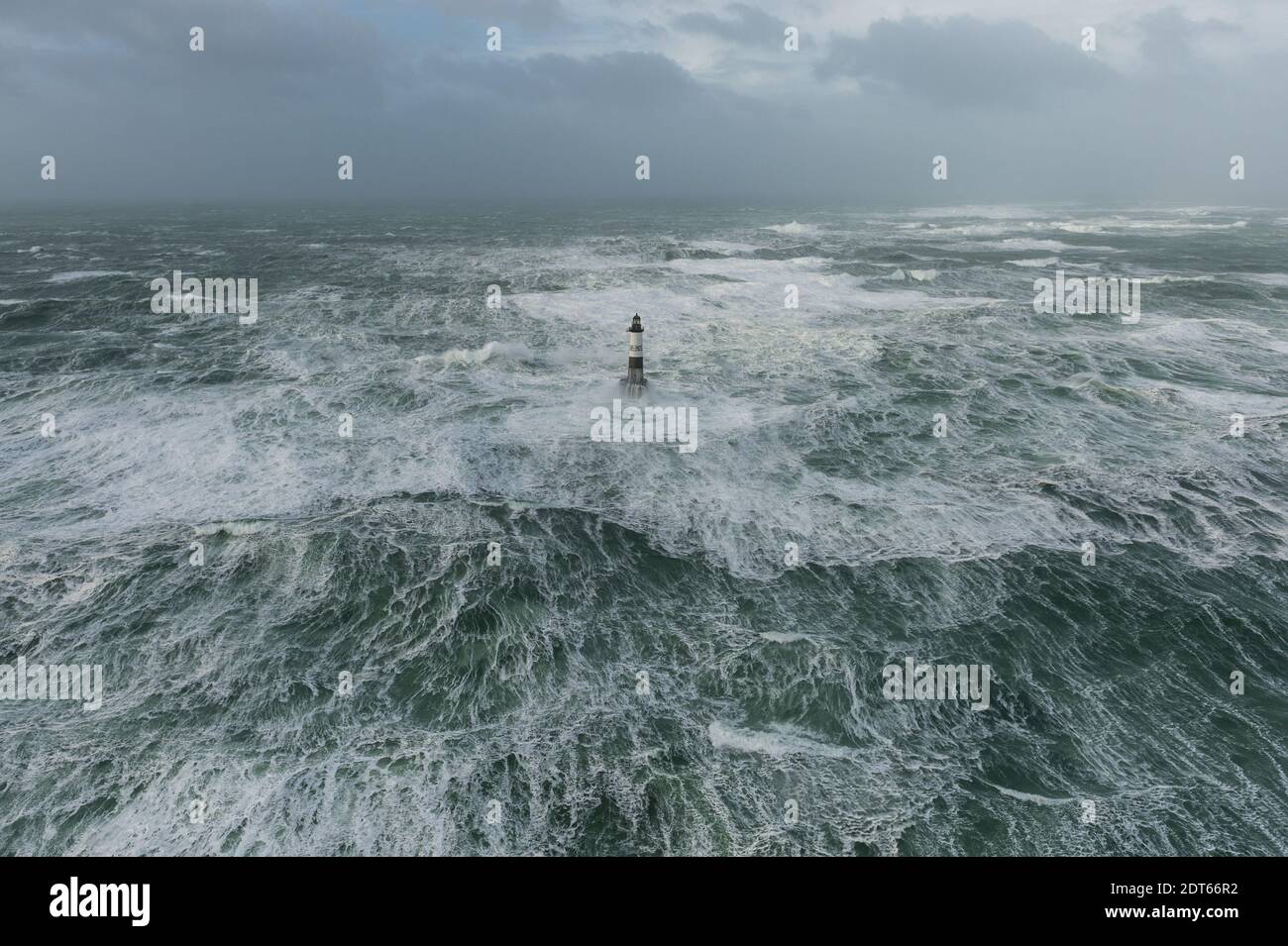 The 'Ar-Men' lighthouse during heavy storm off Brittany, western France ...