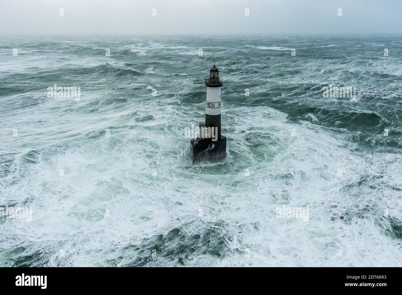 The 'Ar-Men' lighthouse during heavy storm off Brittany, western France ...