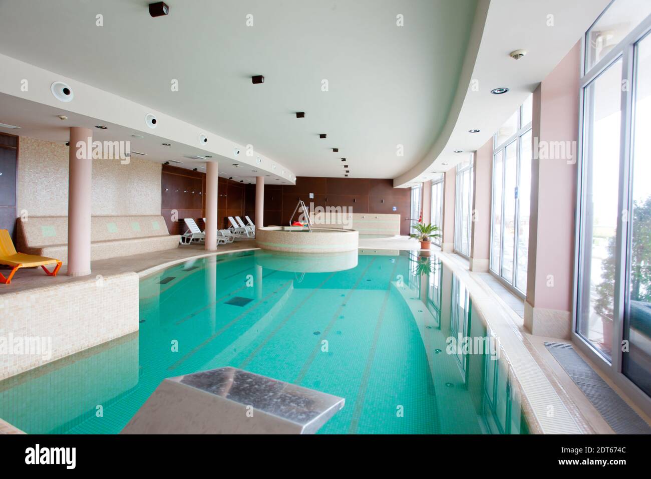 Exclusive indoor swimming pool with clear water Stock Photo - Alamy