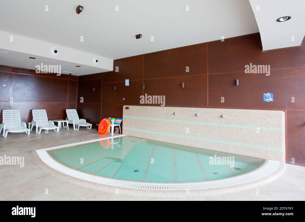 Exclusive indoor swimming pool with clear water Stock Photo - Alamy