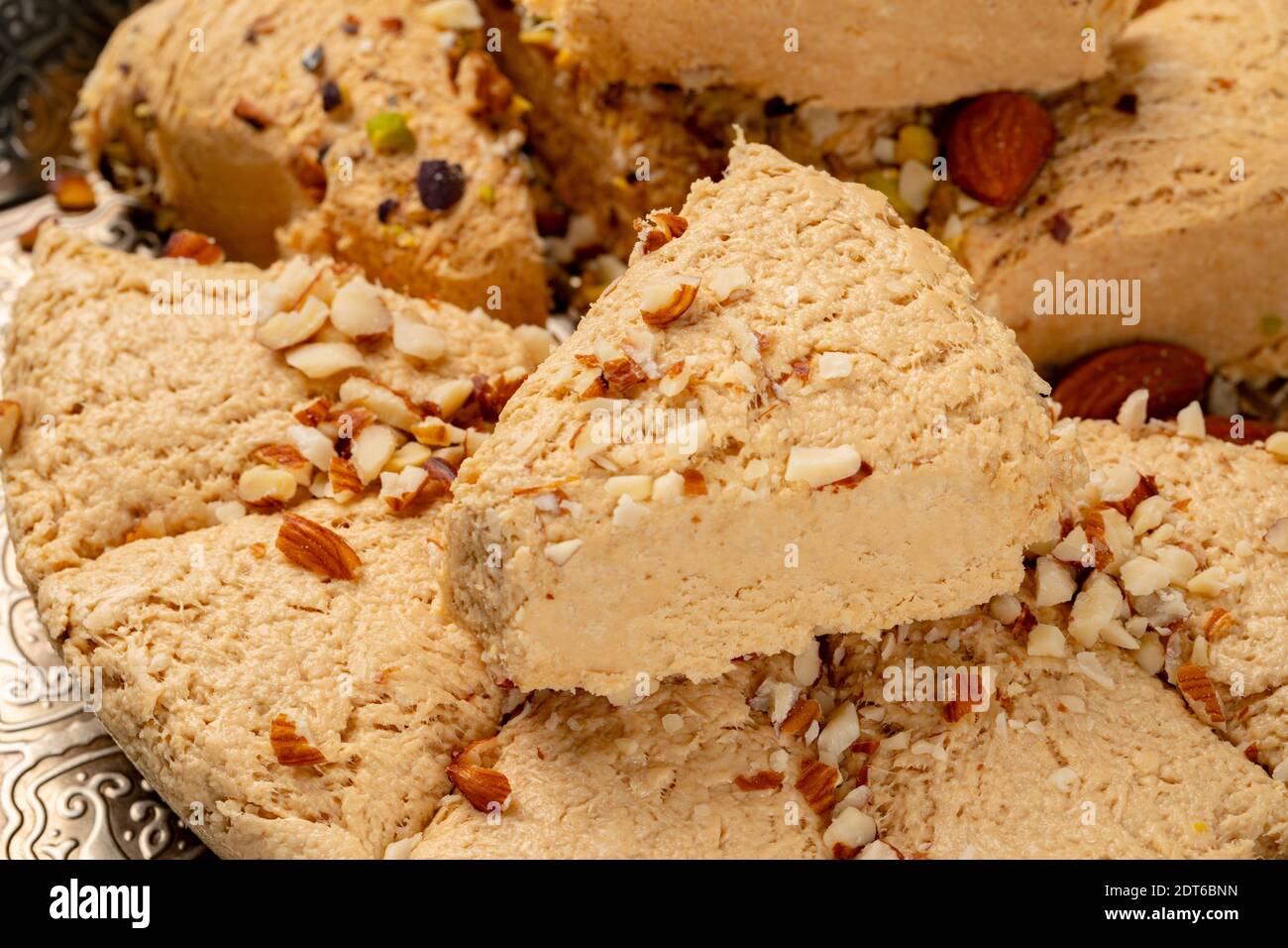 Close up photo of halva dessert on silver plate Stock Photo - Alamy