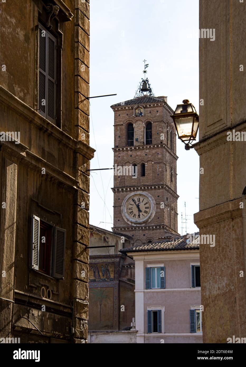 Rome Italy, tower showing clock and old street Stock Photo - Alamy