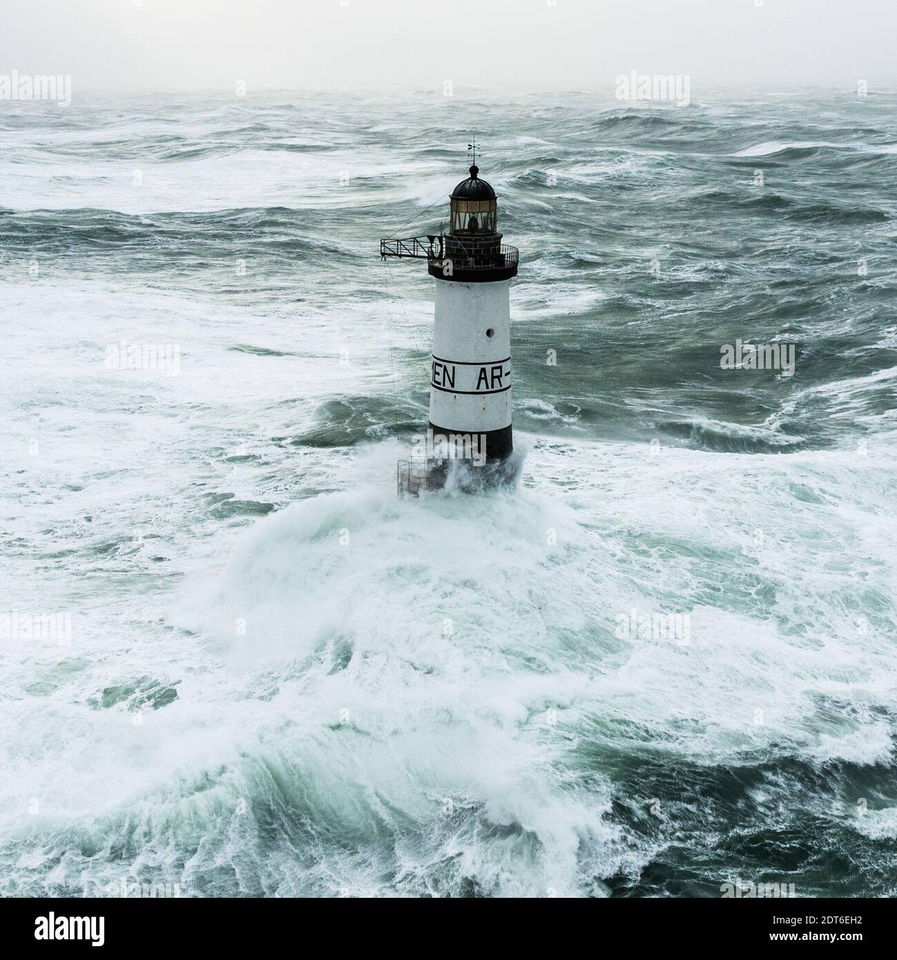 Ar-Men lighthouse during heavy storm off Brittany, western France on ...