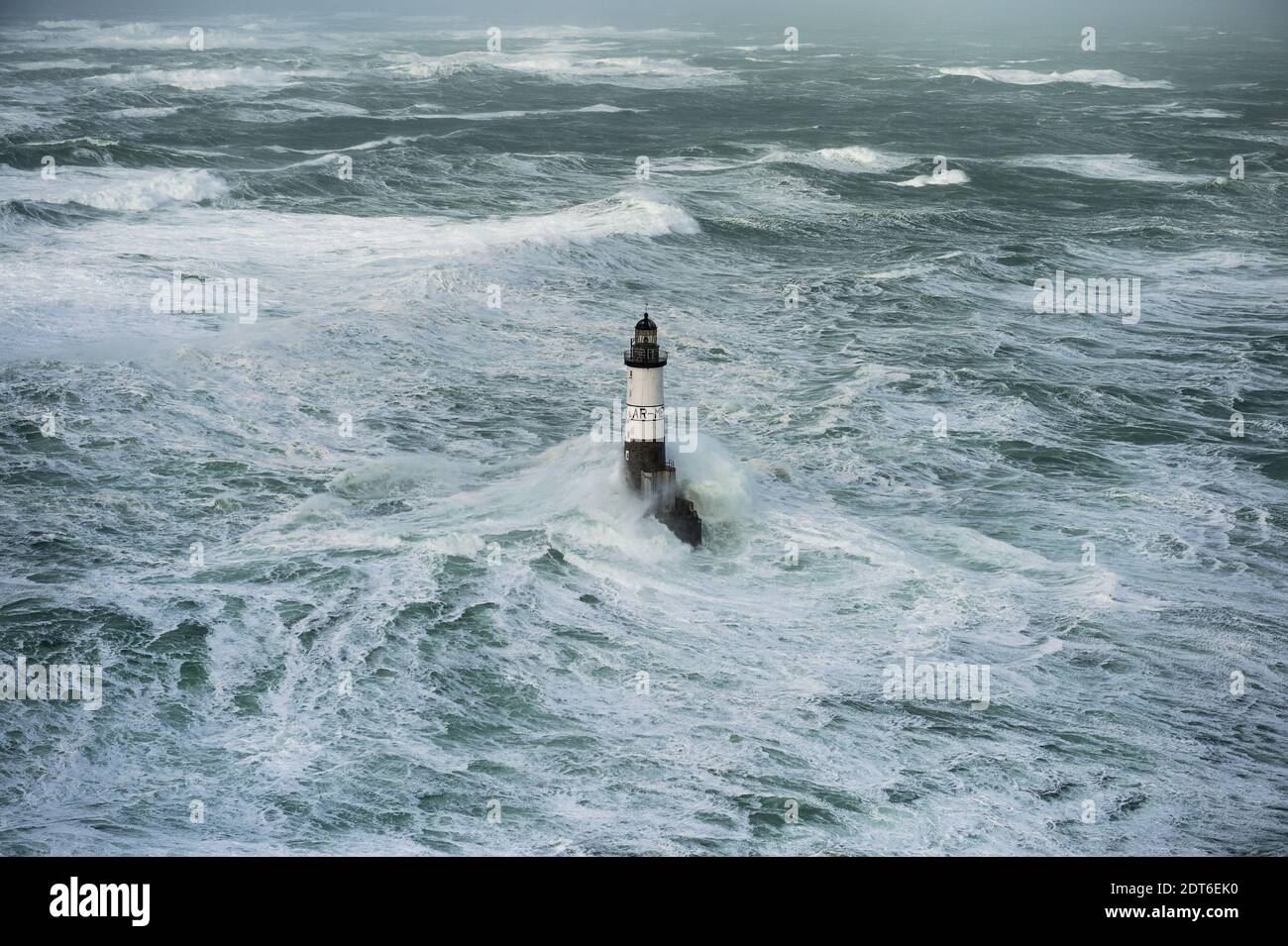 Ar-Men lighthouse during heavy storm off Brittany, western France on ...